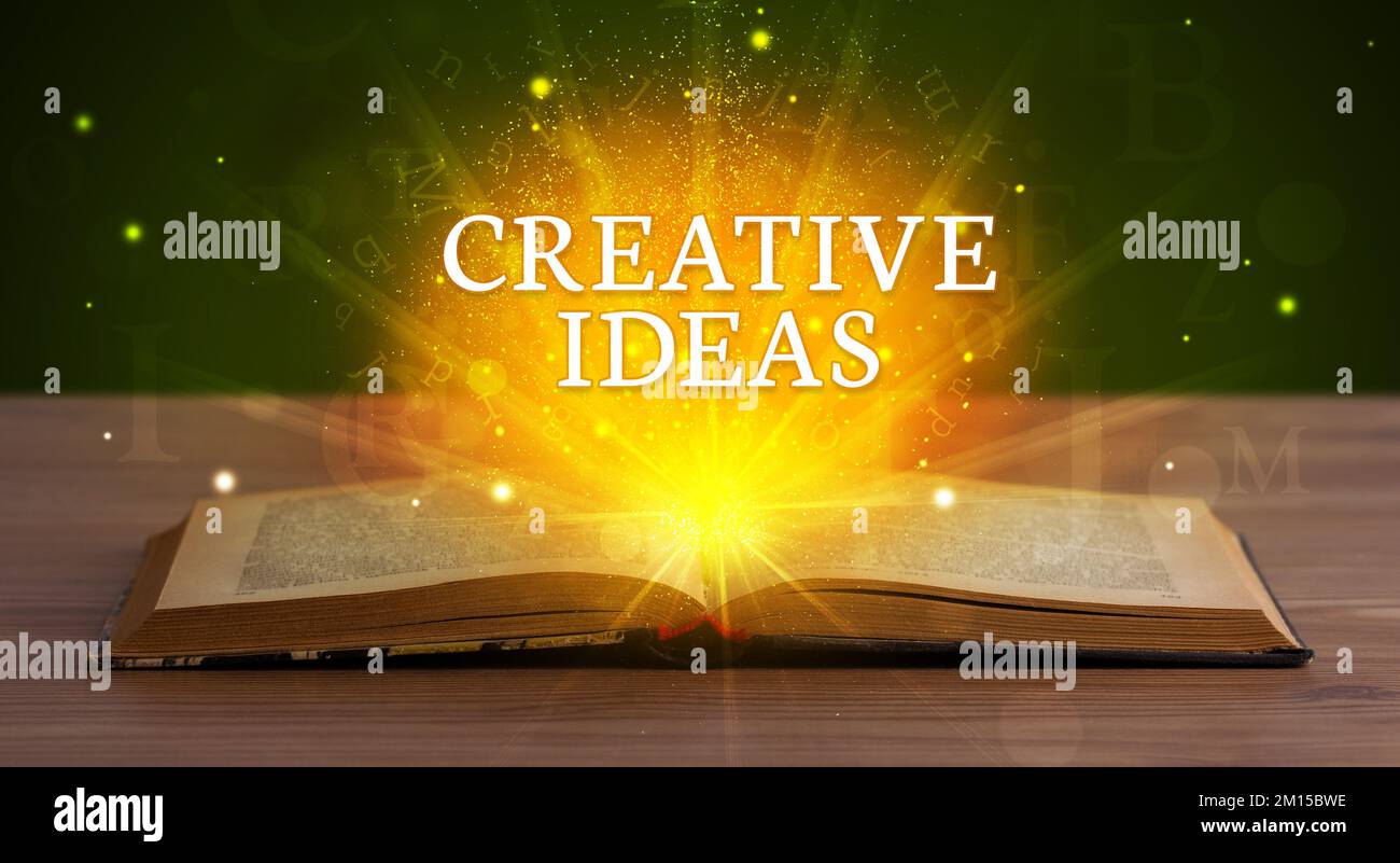 Educational inscription coming out from an open book Stock Photo - Alamy