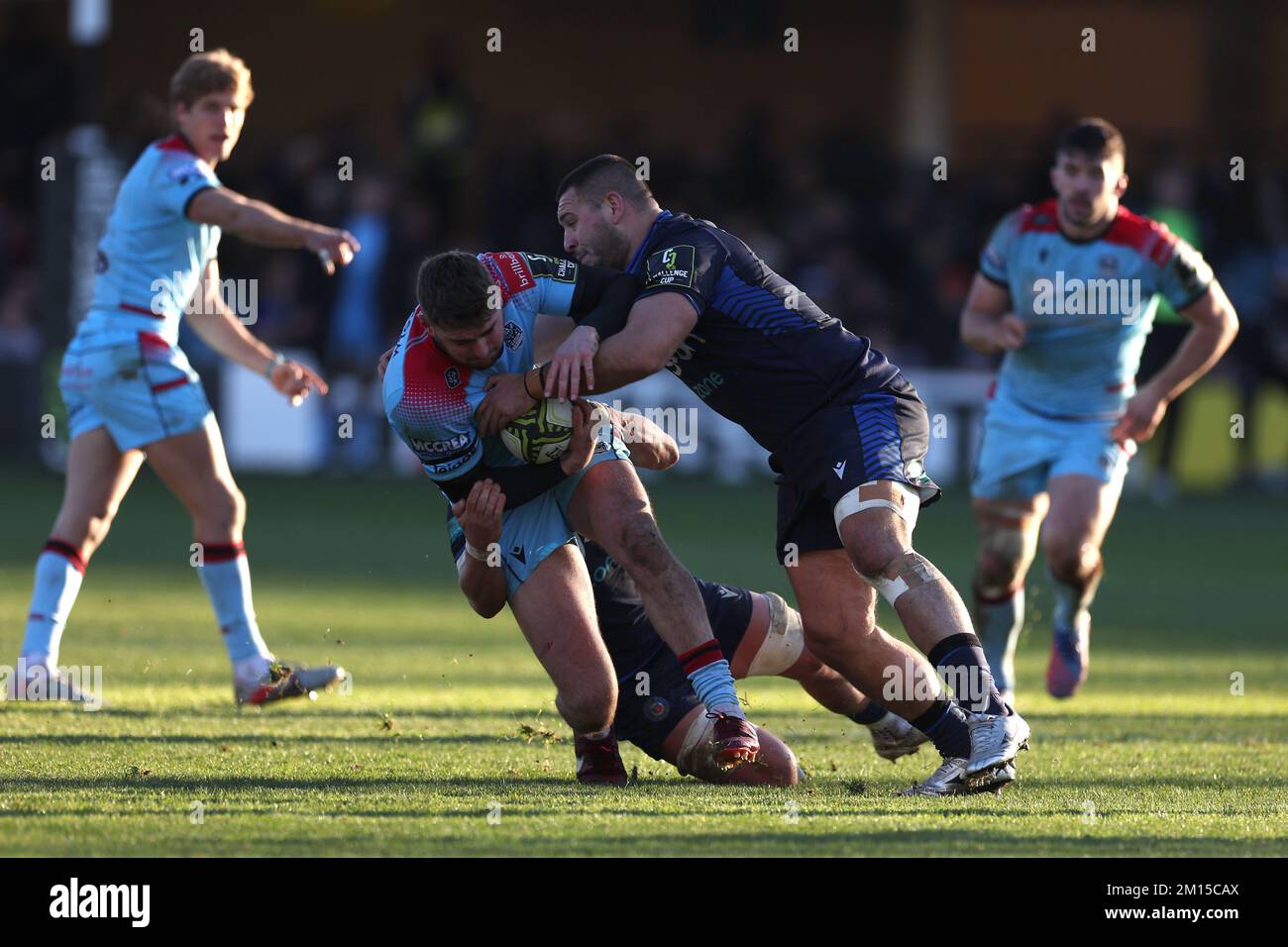 Glasgow Warriors' Ollie Smith is tackled by Bath Rugby's Lewis Boyce ...