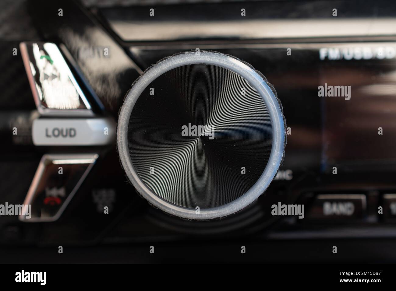 Volume knob on music system Stock Photo - Alamy