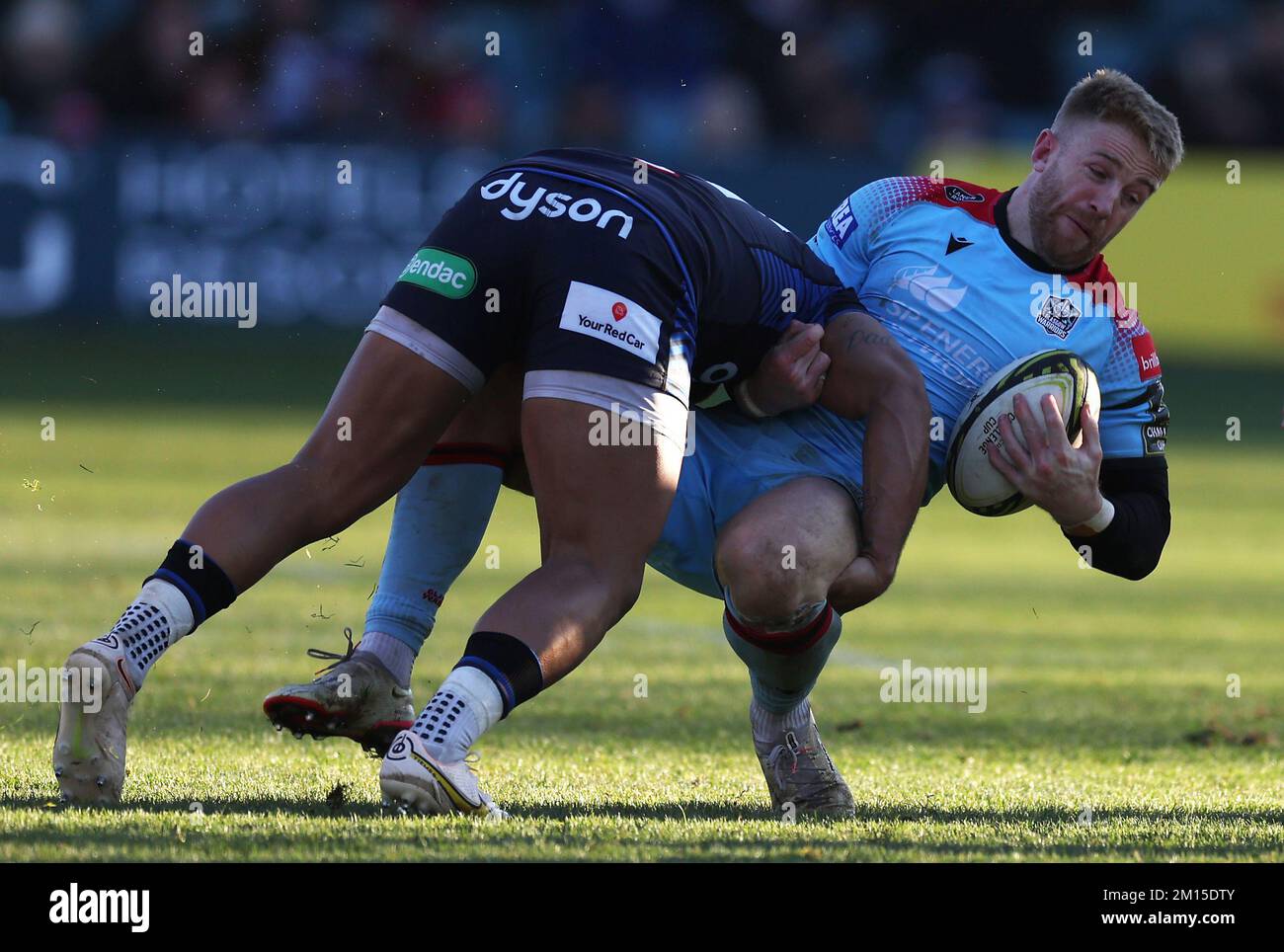 Glasgow Warriors' Kyle Steyn (centre) is tackled by Bath Rugby's Ollie ...