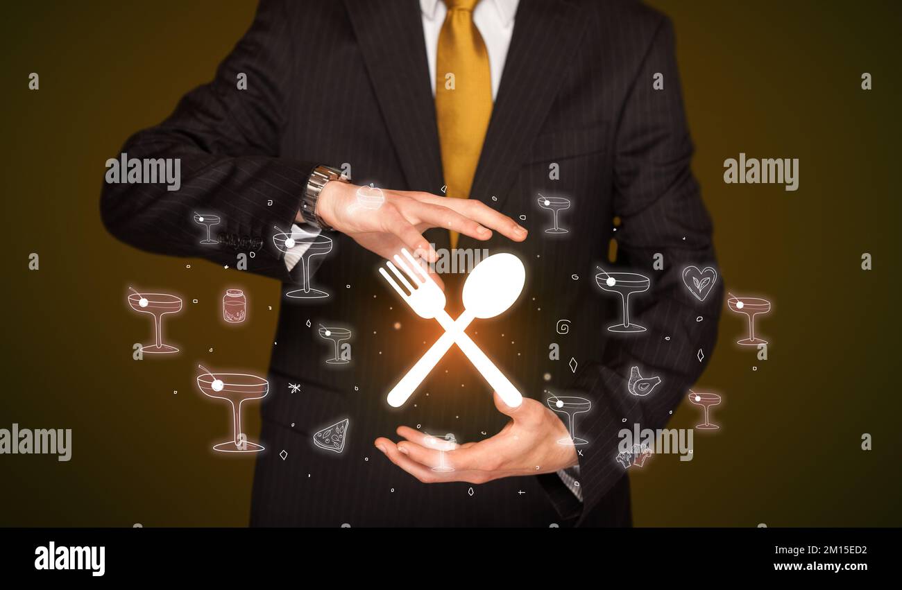 Hand holding food related icons Stock Photo - Alamy