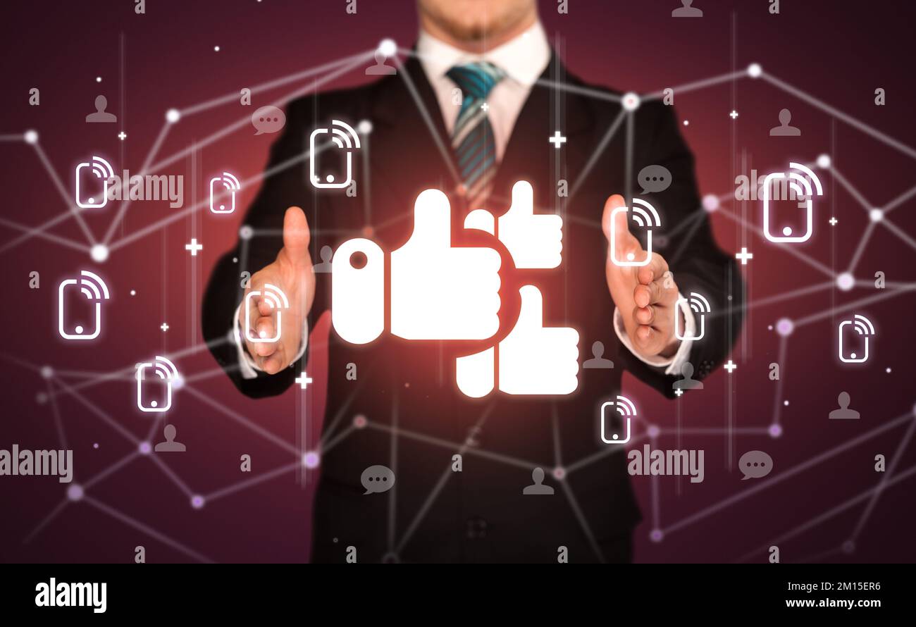 Hand holding social media icons Stock Photo - Alamy