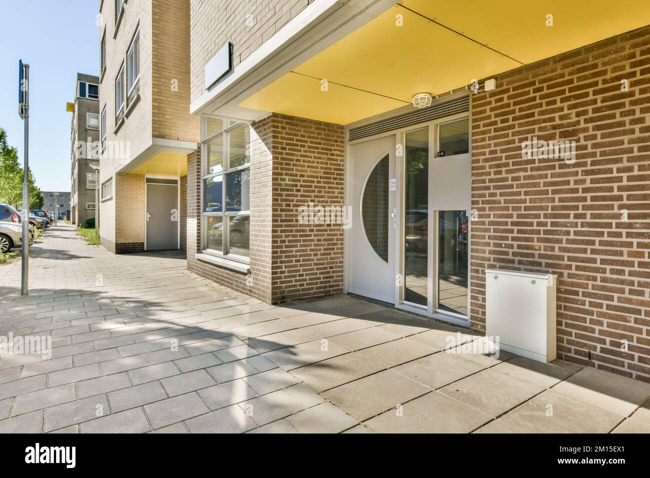 View of street near building with beauty of vegetation outside Stock ...