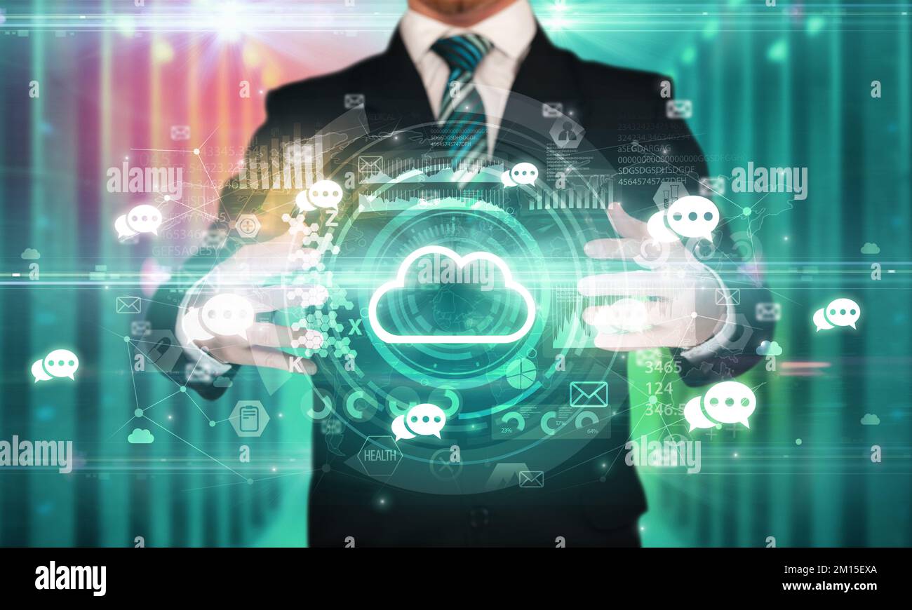 Businessman holding technology icon concept Stock Photo - Alamy