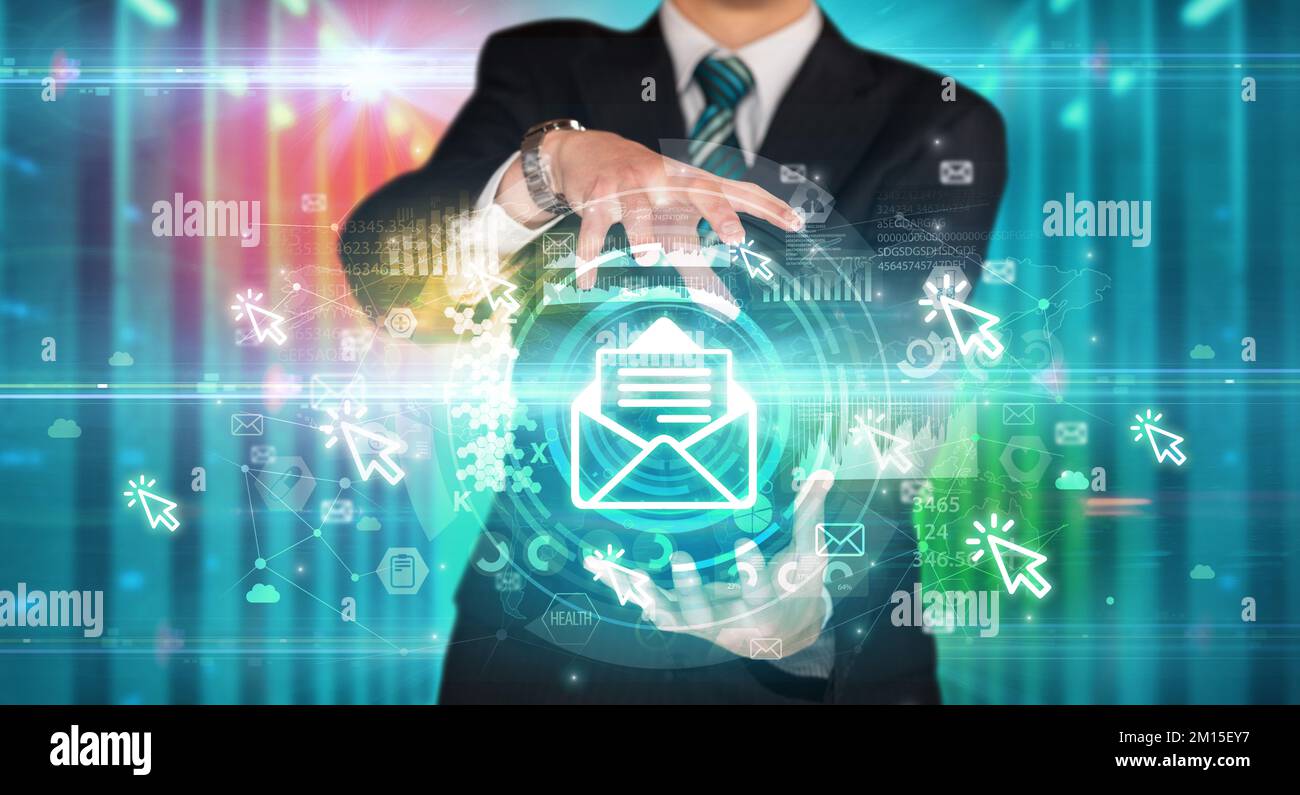 Businessman holding technology icon concept Stock Photo - Alamy