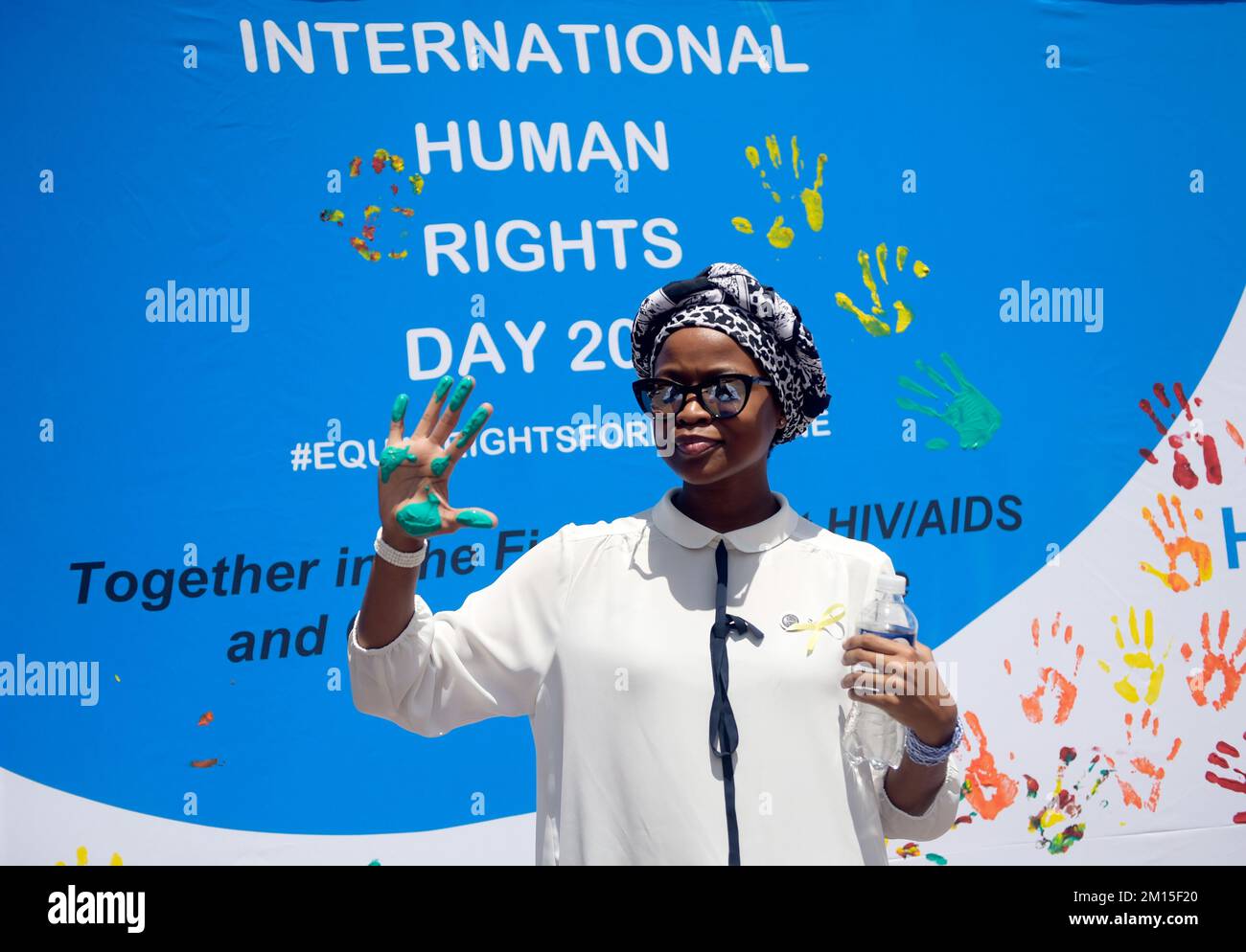 Gaborone. 9th Dec, 2022. A woman shows her painted hand during a public ...