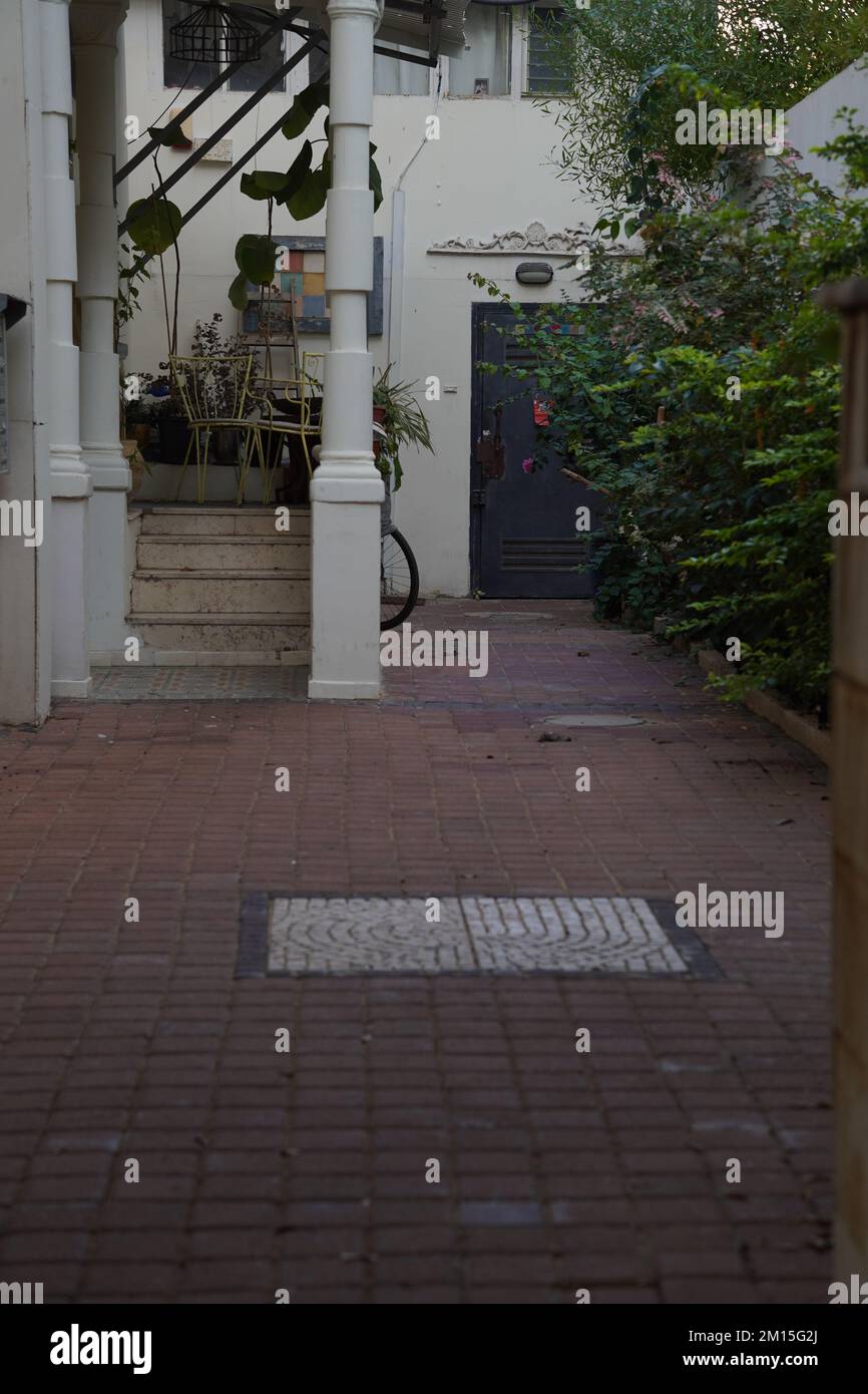 The gap between buildings Narrow pathway in tel aviv street Stock Photo ...