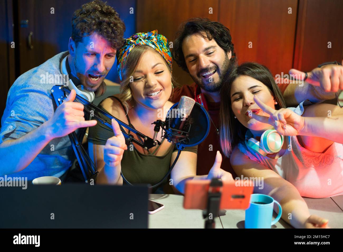 Group of influencer connecting live streaming on social media platforms ...