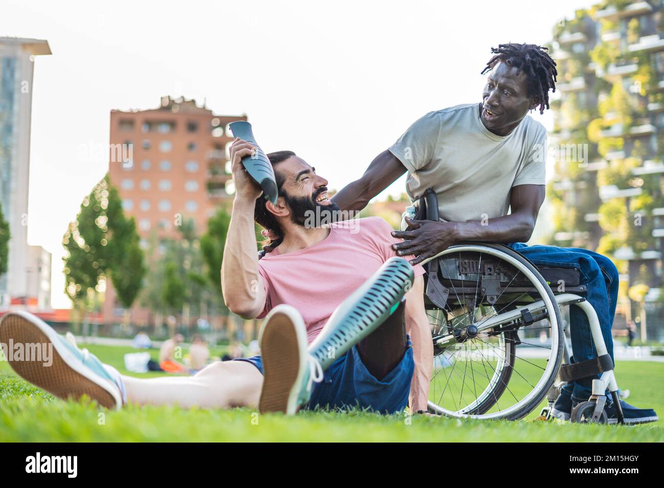 Portrait of two disabled adults. Hispanic man with prosthetic leg ...