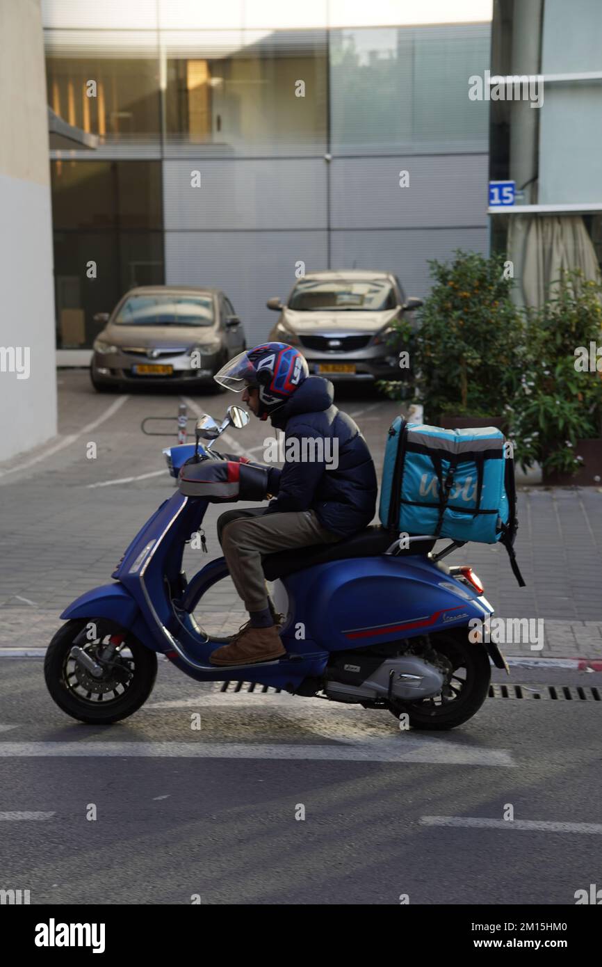 wolt delivery on a motorbike in tel aviv Stock Photo - Alamy