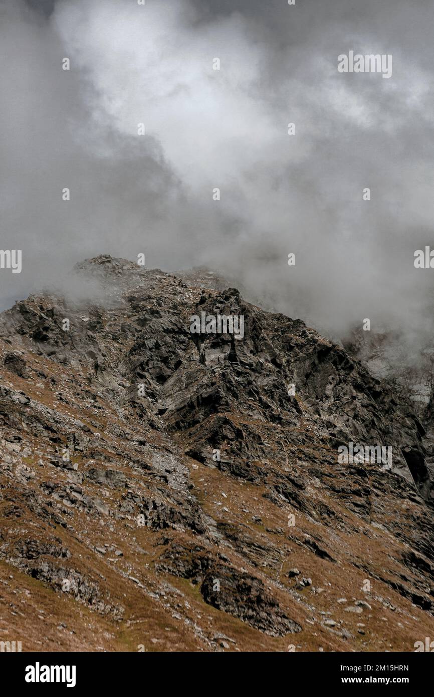 A vertical aerial landscape of the rocky hill San Bernardino covered in ...