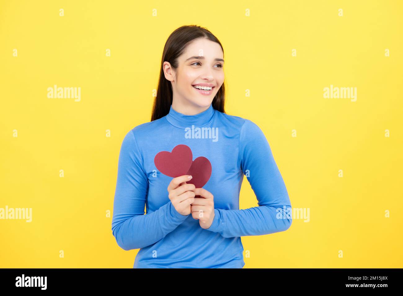 Beautiful amazing woman cuddle paper card heart shape, dreamy isolated ...