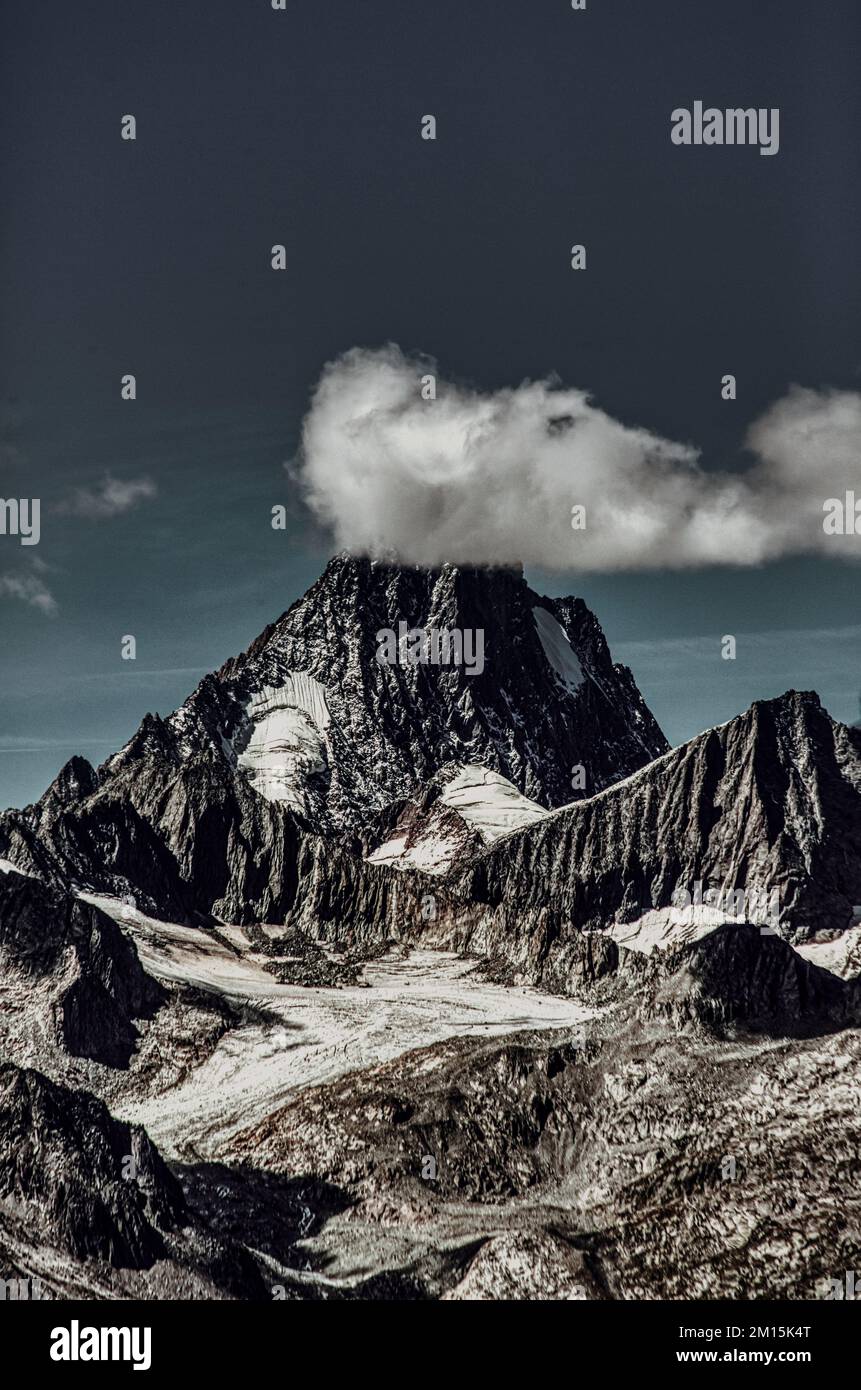 An aerial vertical landscape of the beautiful rocky Nufenen mountain ...
