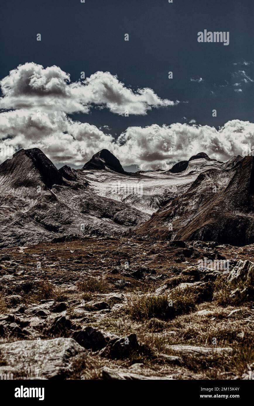 An aerial vertical landscape of the beautiful rocky Nufenen mountain ...