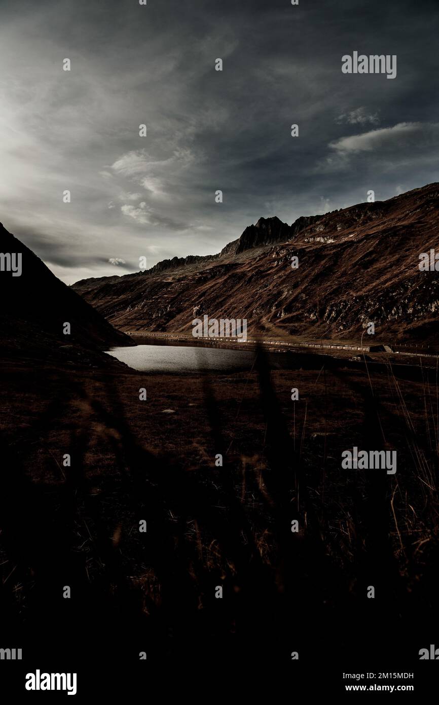 A vertical mesmerizing landscape of a lake in the the rocky mountains ...