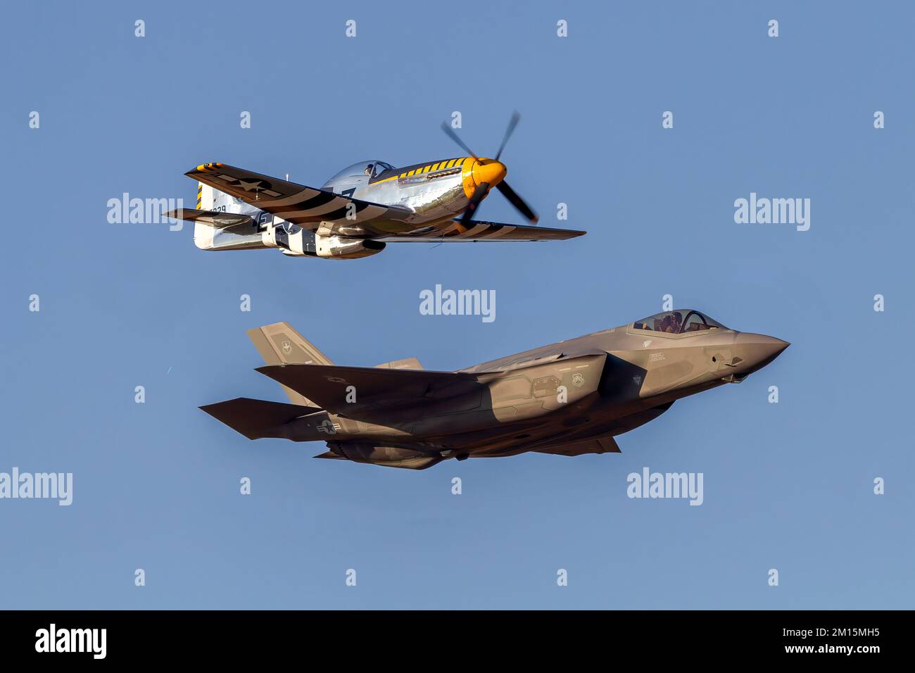 An F-35 Lightning and a North American P-51D Mustang performing a ...