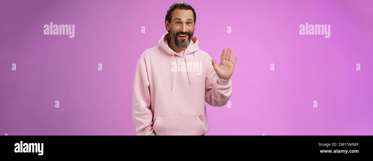 Cheeky charismatic funny happy smiling mature man bearded grey hair in ...