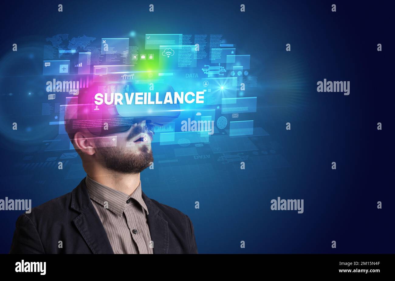 Businessman looking through Virtual Reality glasses Stock Photo - Alamy