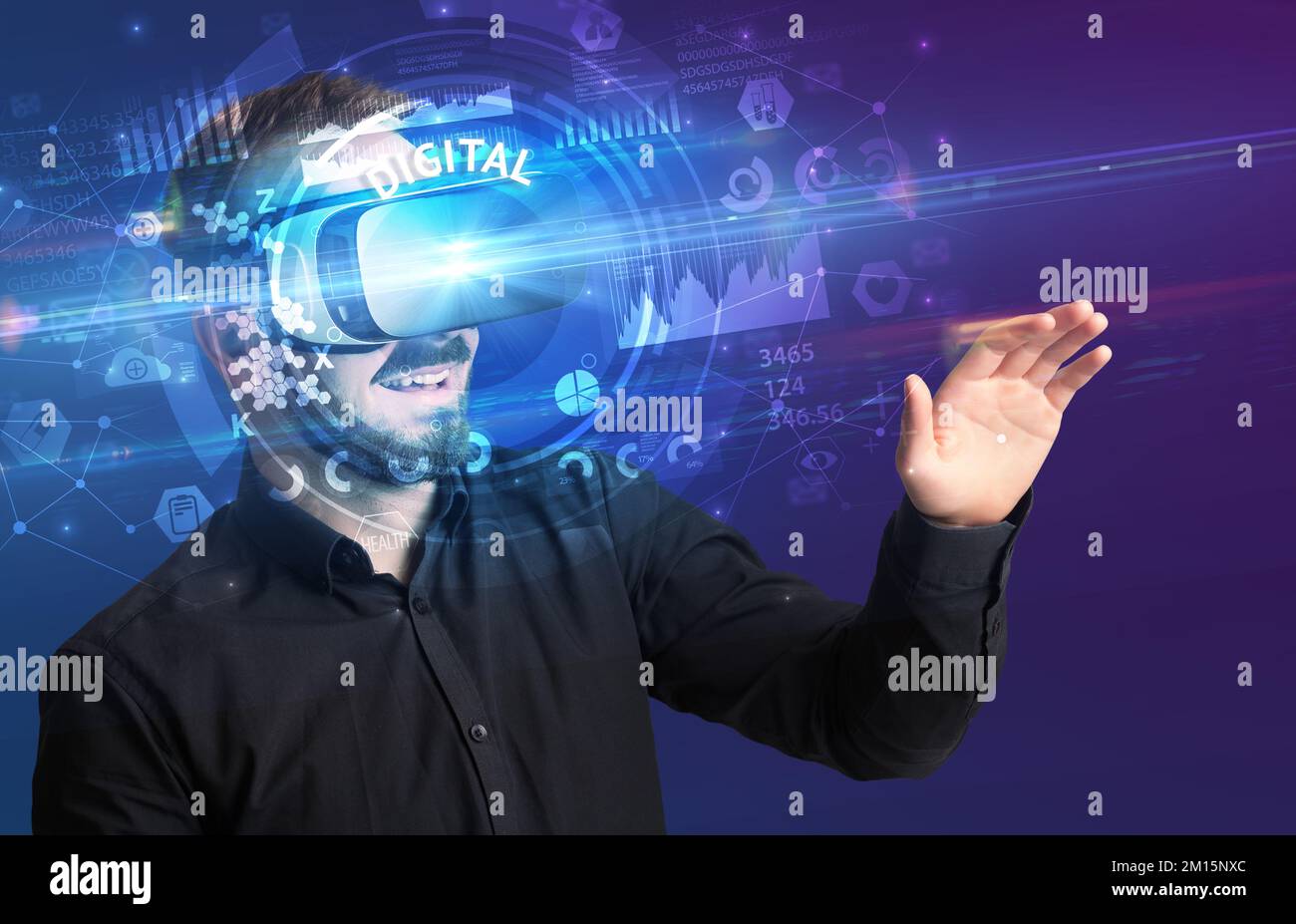 Businessman looking through VR glasses Stock Photo - Alamy