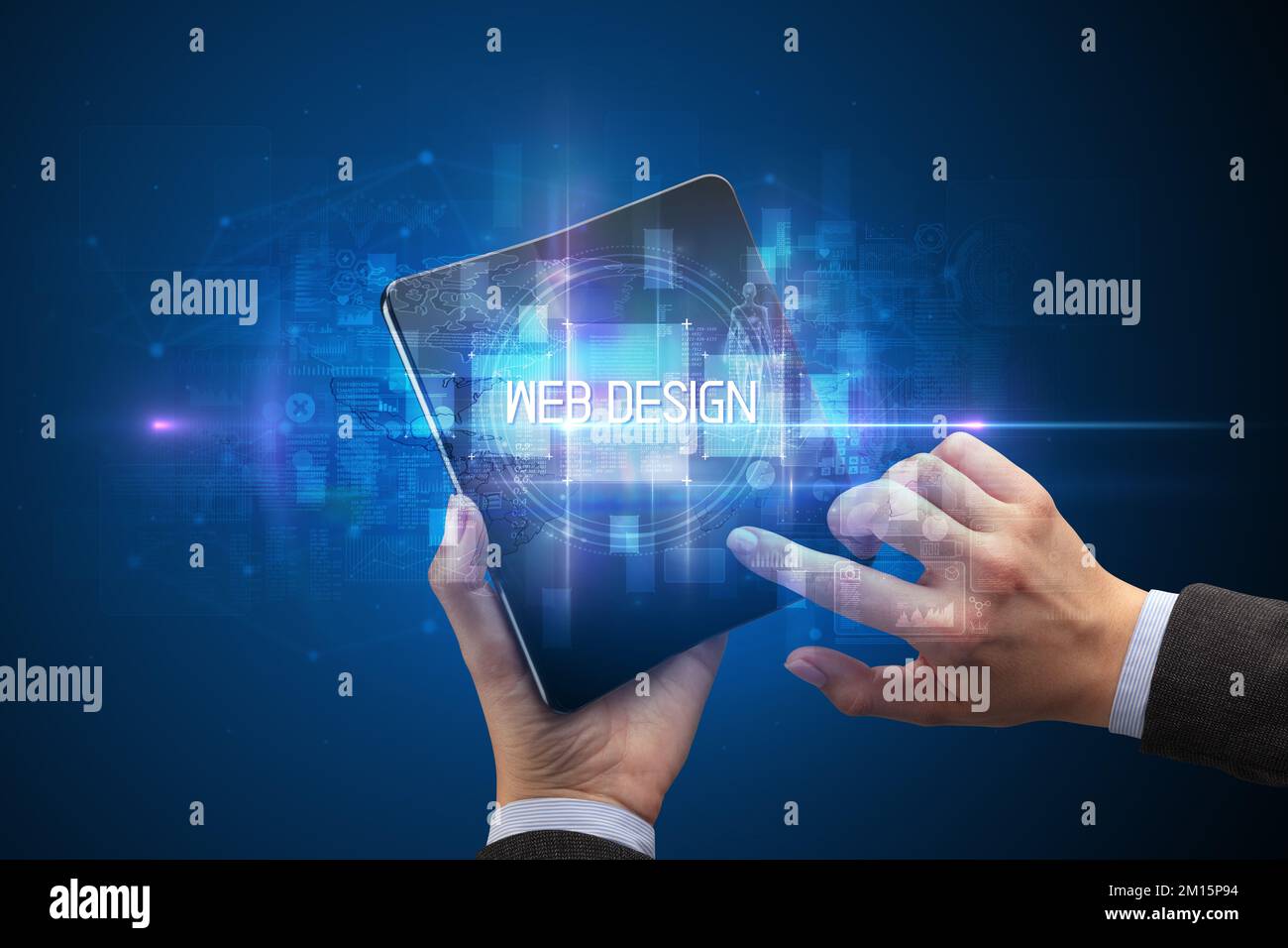 Businessman holding a foldable smartphone Stock Photo - Alamy