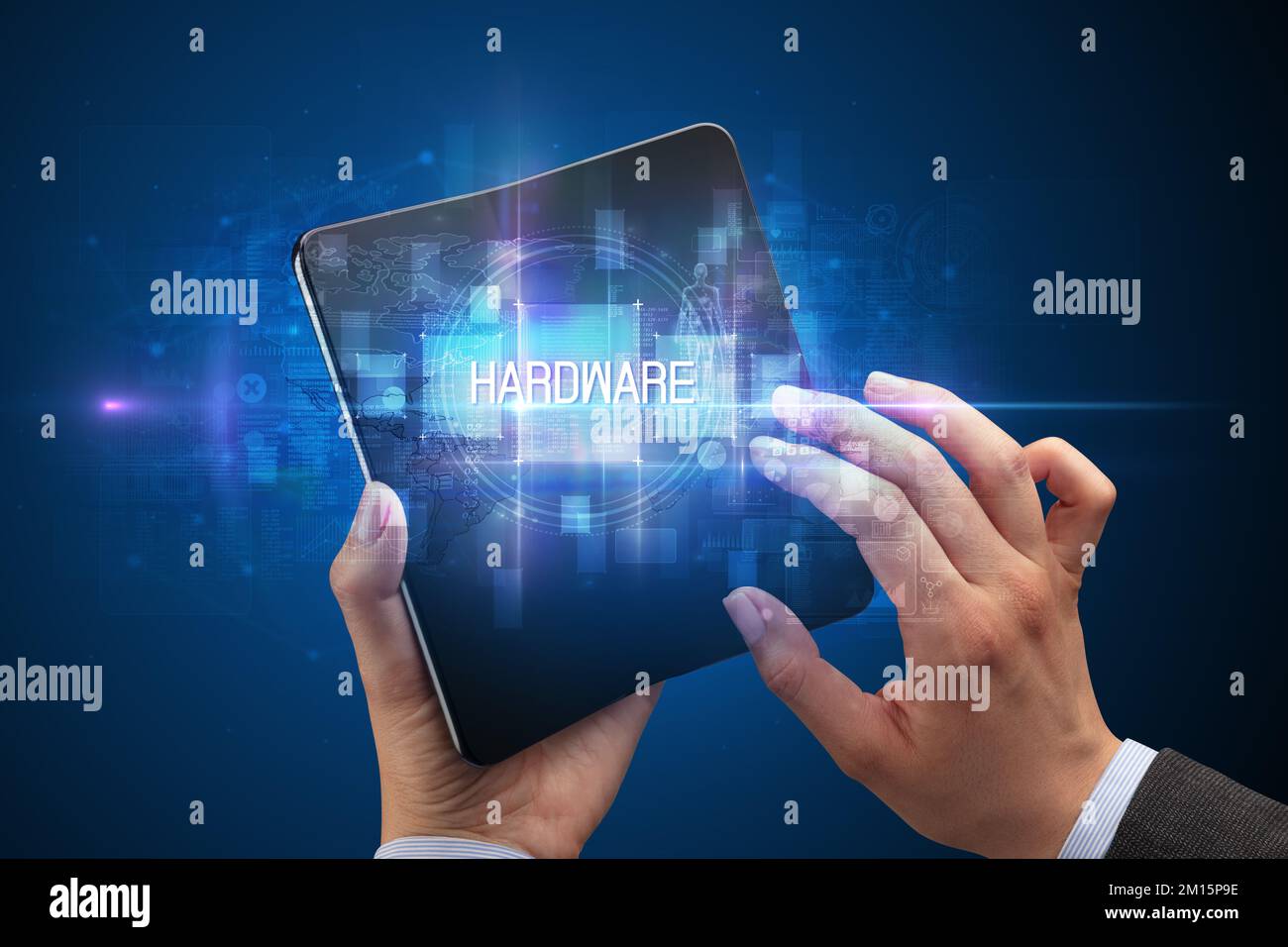 Businessman holding a foldable smartphone Stock Photo - Alamy