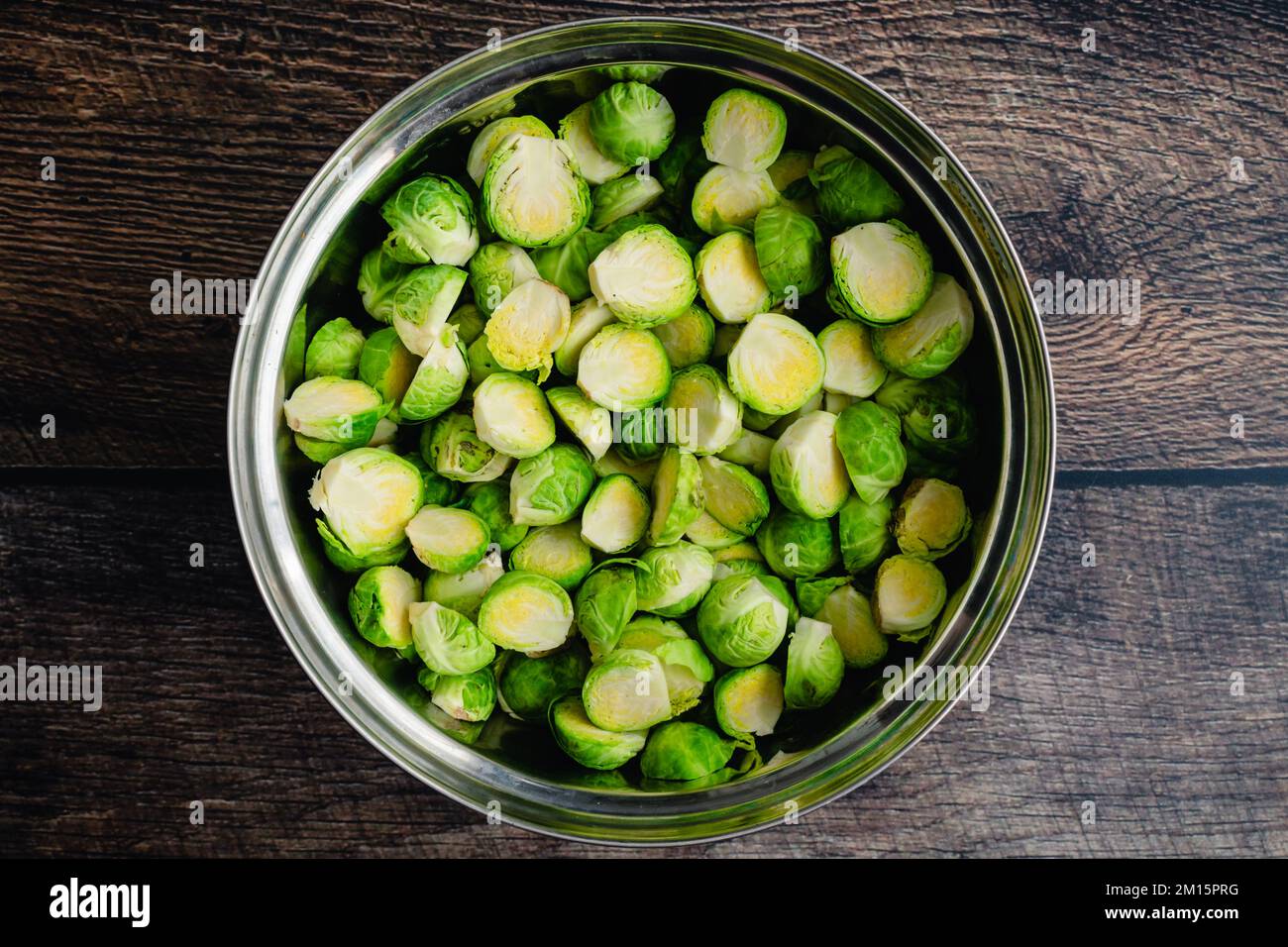 Halved and Trimmed Raw Brussels Sprouts in a Mixing Bowl: Uncooked ...