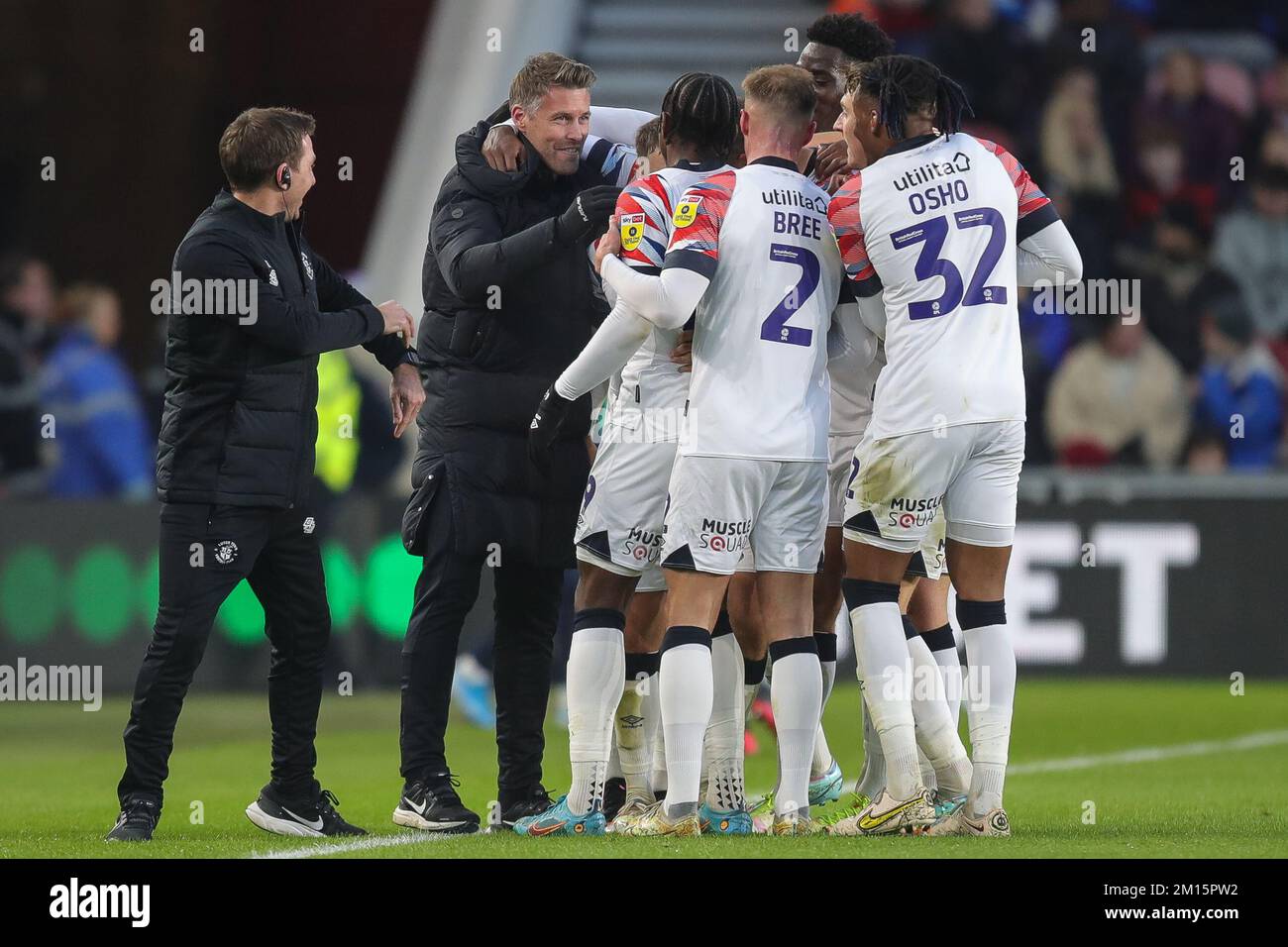 Rob Edwards manager of Luton Town celebrates with his team as they open ...