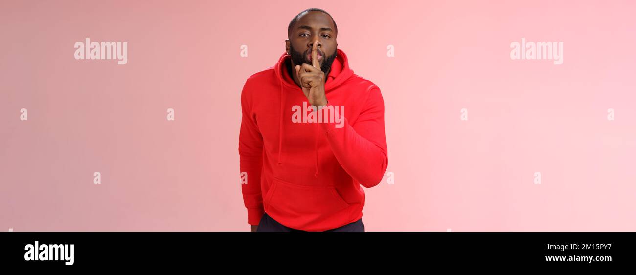 Shhh it taboo. Portrait sensual funny cute african-american bearded man ...