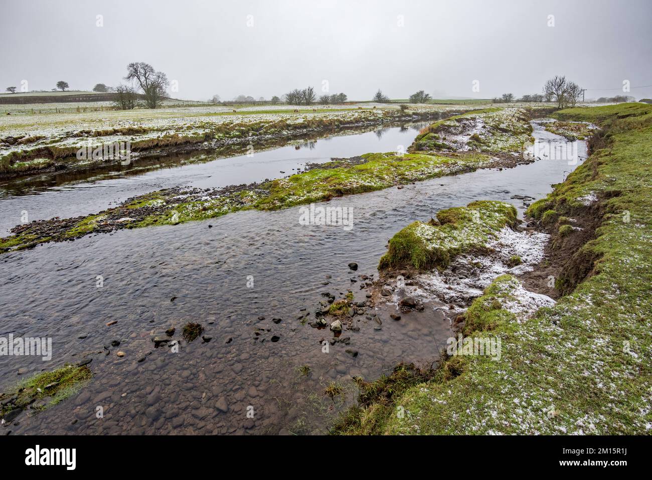 Long preston beck as it joins the ribble hi-res stock photography and ...