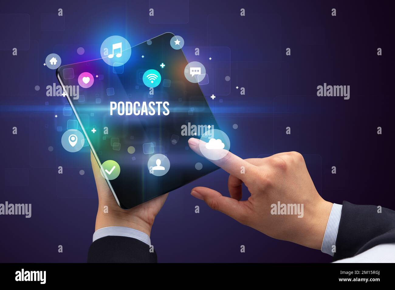 Businessman holding a foldable smartphone Stock Photo - Alamy