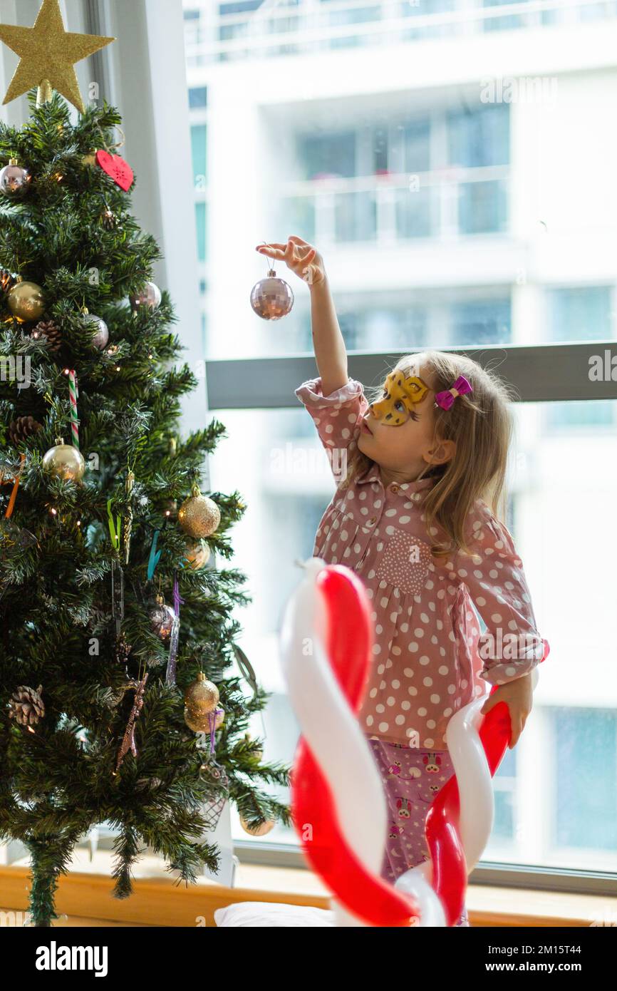 Kid reaching for candy hi-res stock photography and images - Alamy