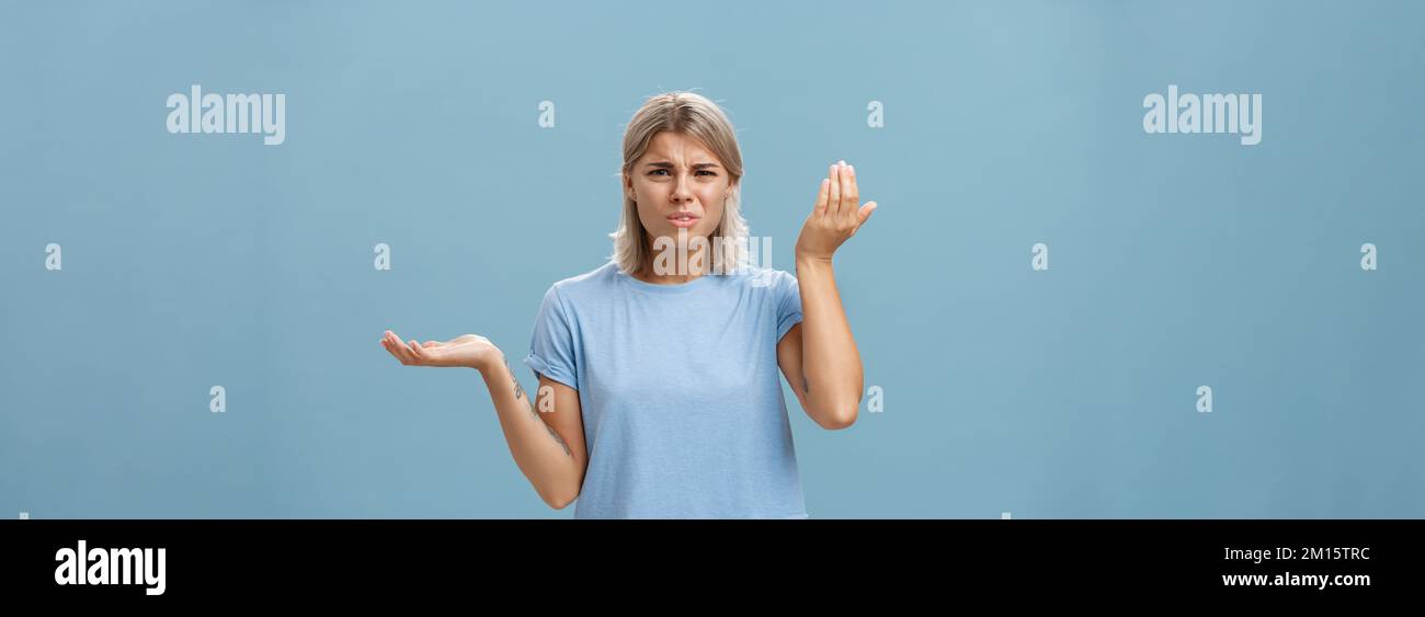 Wtf you saying. Portrait of pissed and confused stylish girlfriend with ...