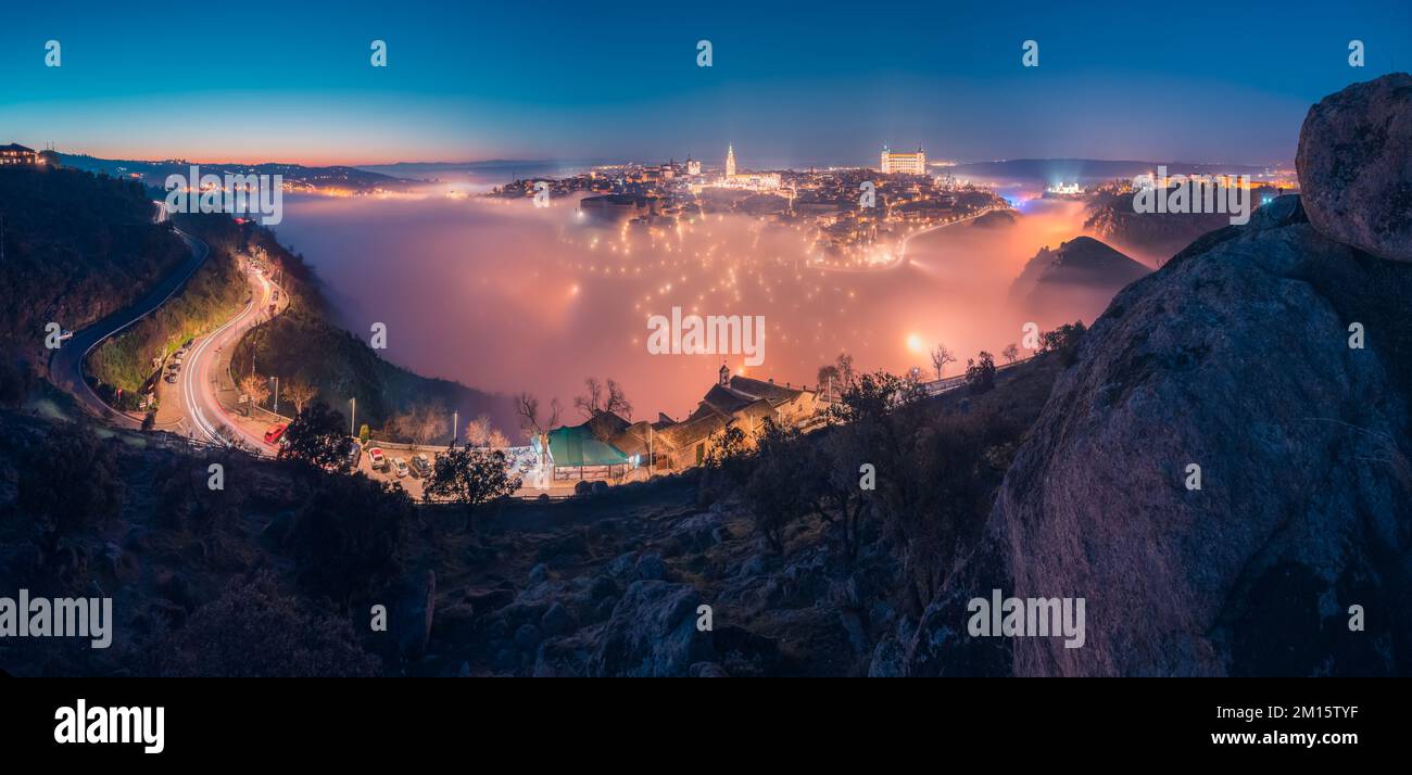 From above amazing scenery of illuminated ancient Alcazar de Toledo ...