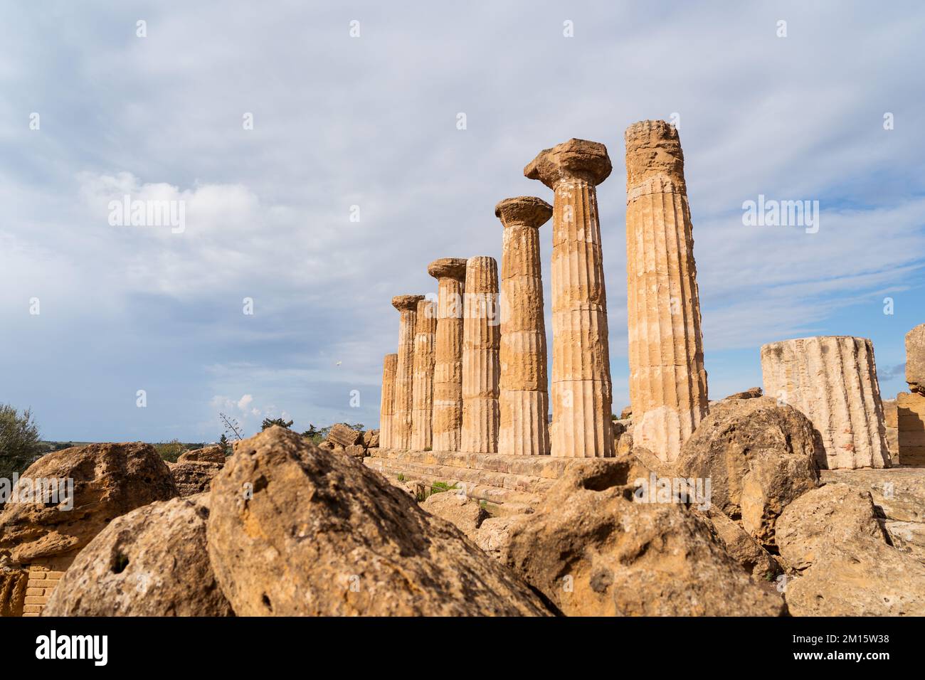 Old historic Temple of Heracles under cloudy sky located in Agrigento ...
