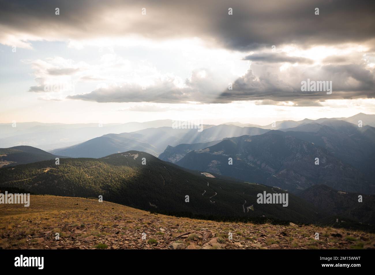 Sun rays through mountain hi-res stock photography and images - Alamy