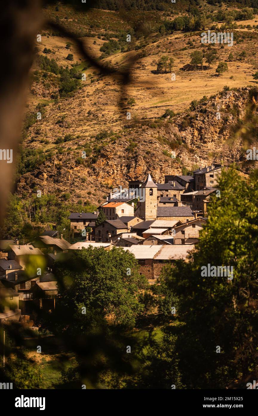 Majestic scenery of slope with medieval town buildings on range on ...