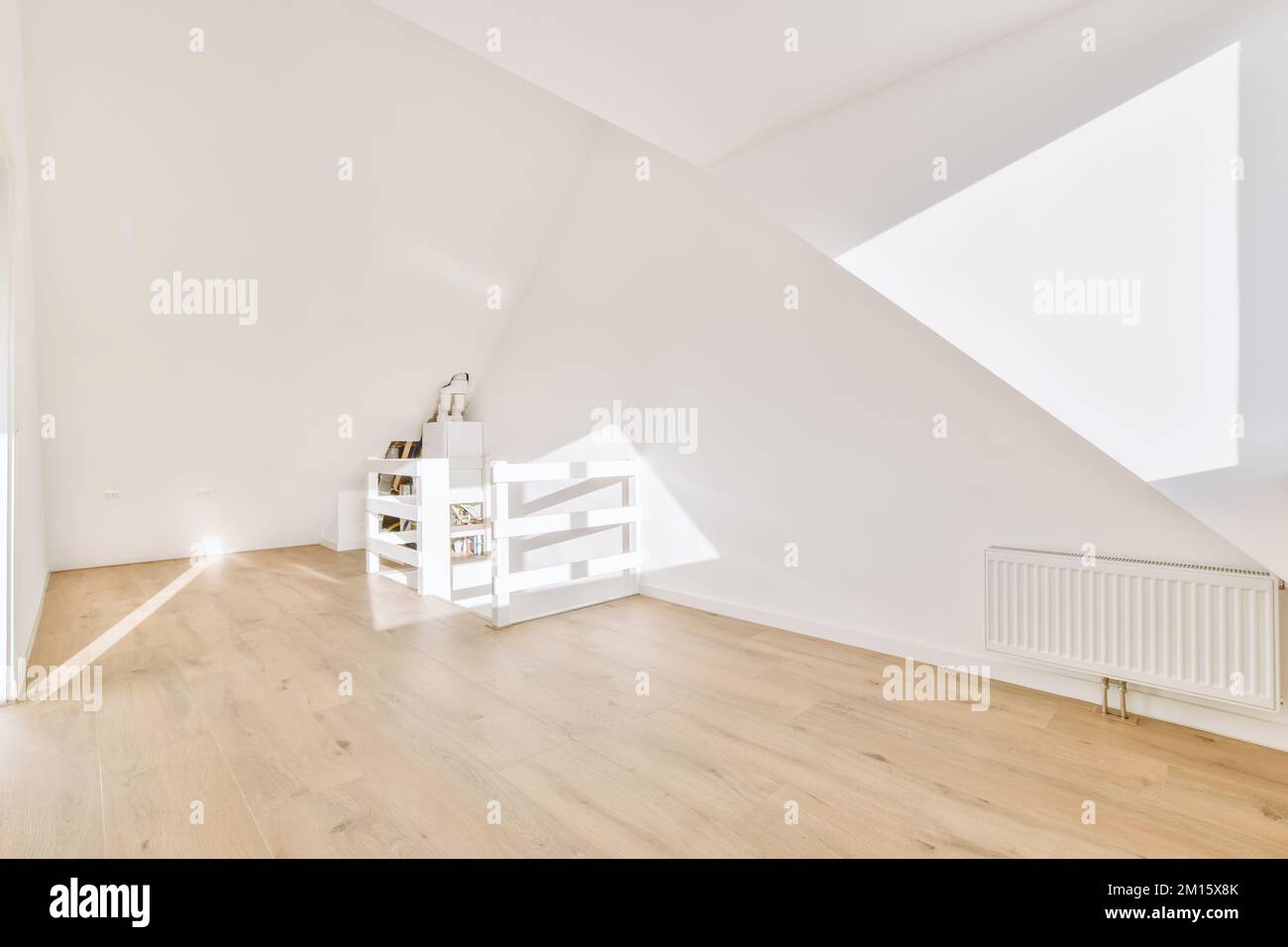 Wooden railing in attic room of big house with parquet floor Stock ...
