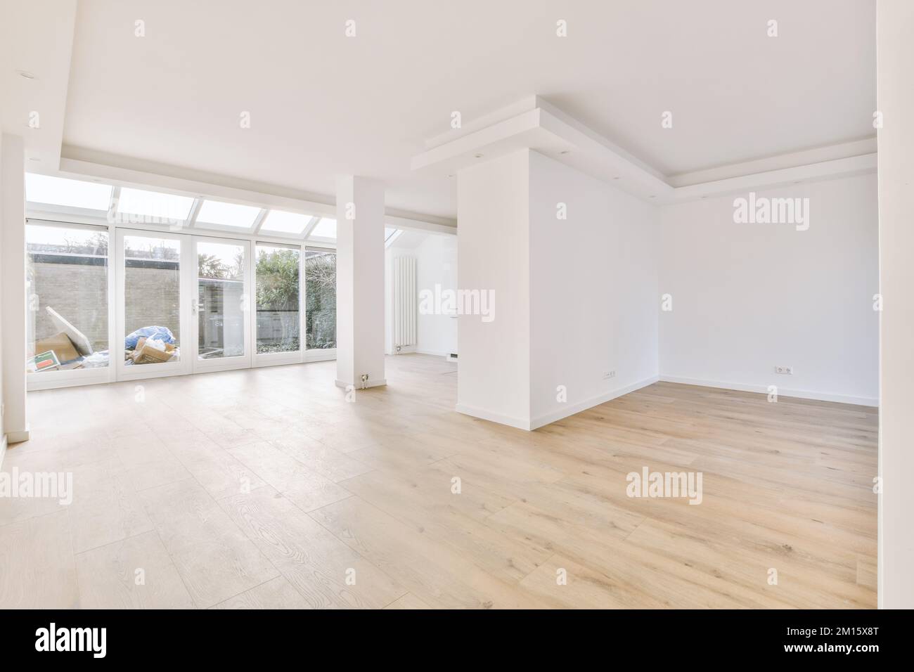 Empty light room with big windows at ground floor at home Stock Photo ...