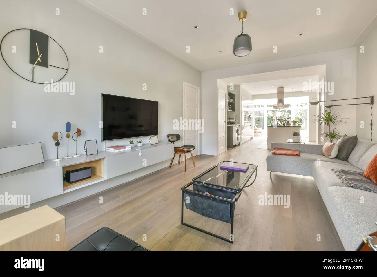 Modern interior of dining room with television by the wall Stock Photo ...