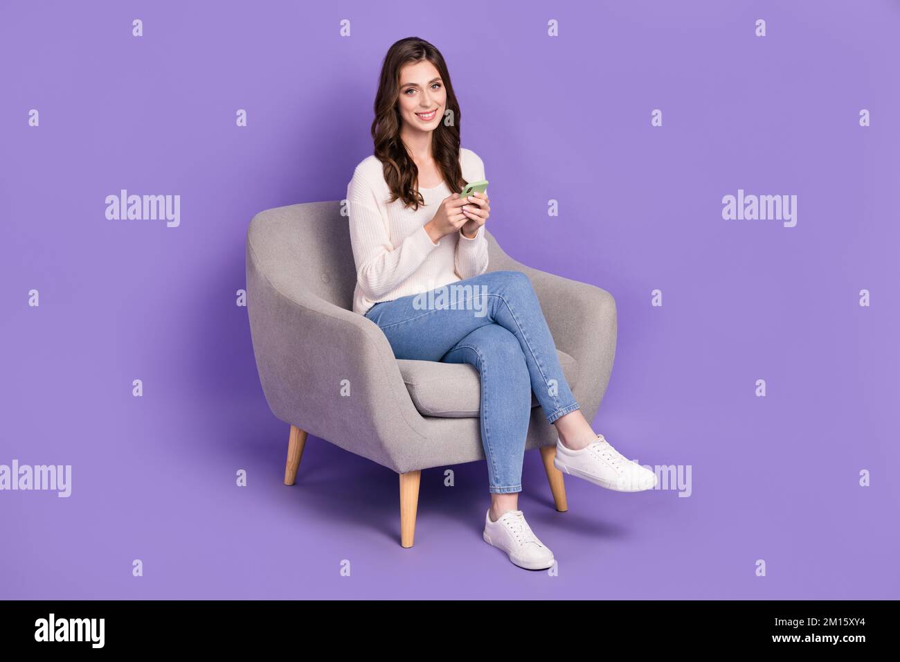 Photo of adorable lady sitting chair use telephone device samsung ...
