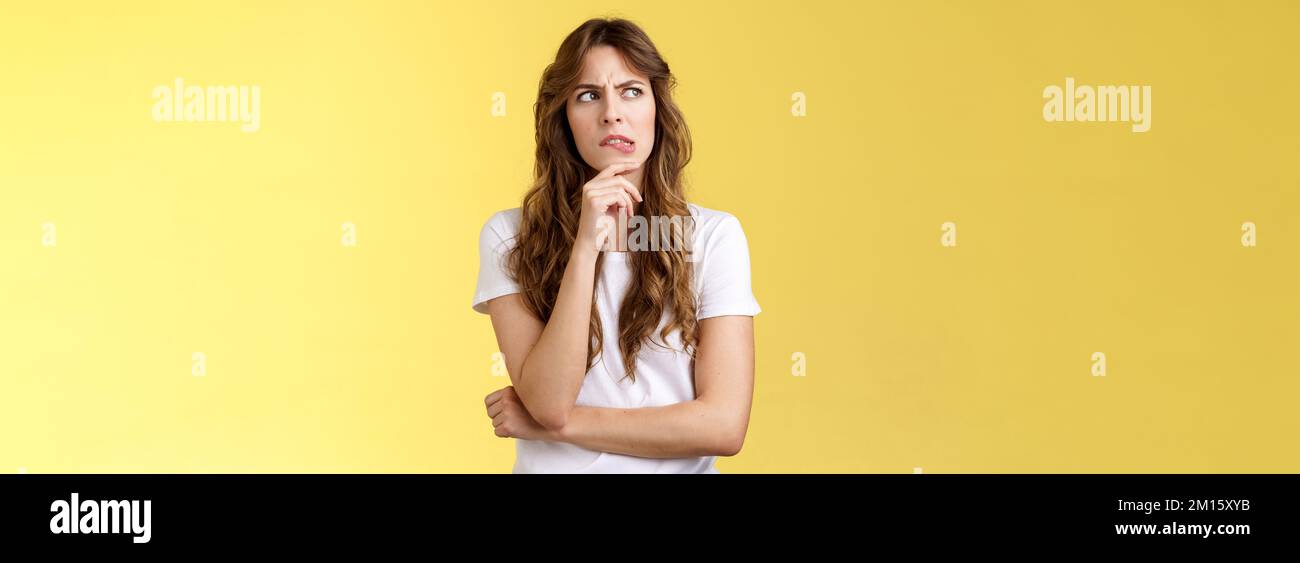 Hmm what should I do. Thoughtful intense smart creative good-looking ...