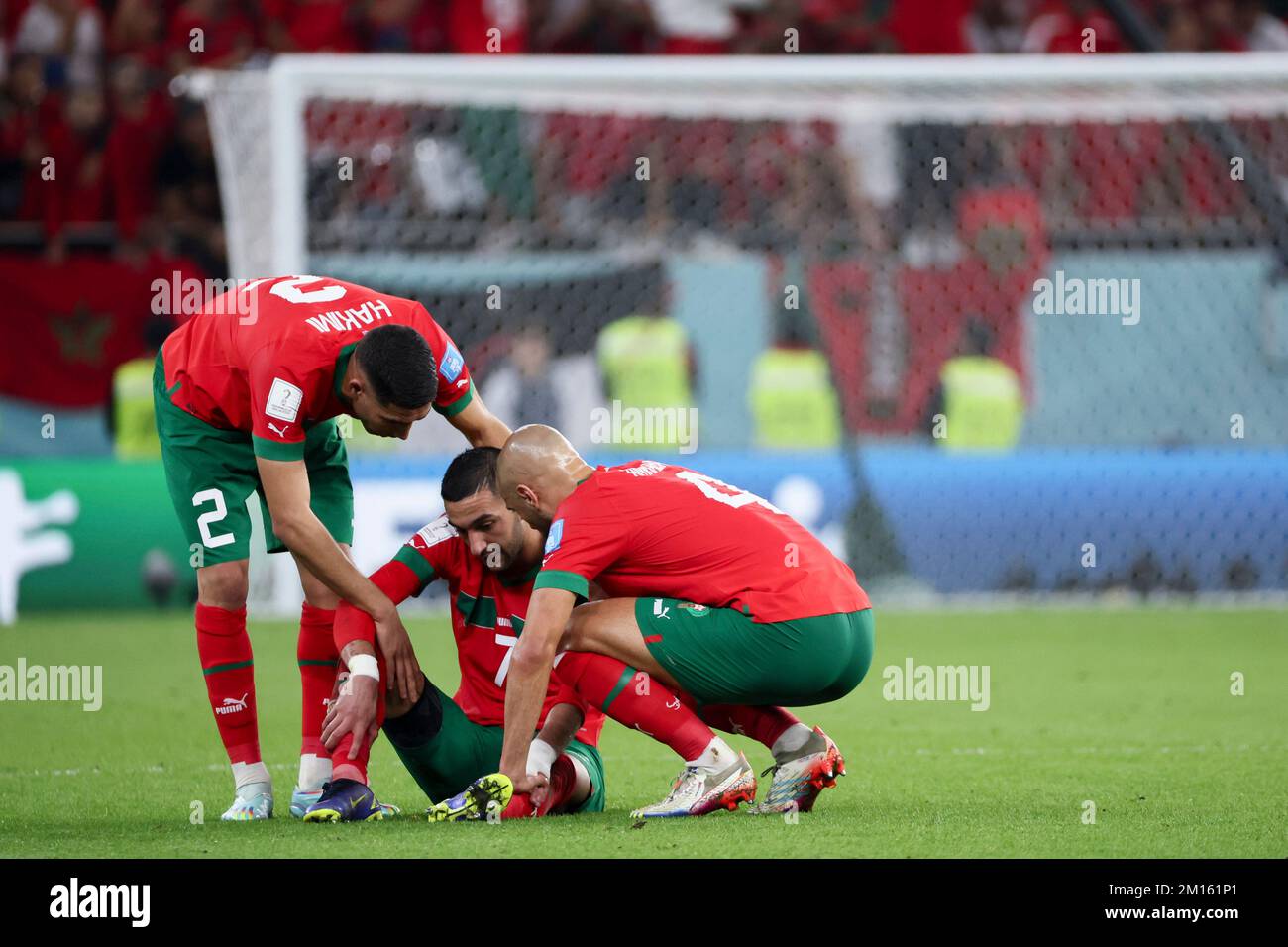 Doha, Qatar. 10th Dec, 2022. Hakim Ziyech (C) of Morocco reacts after ...