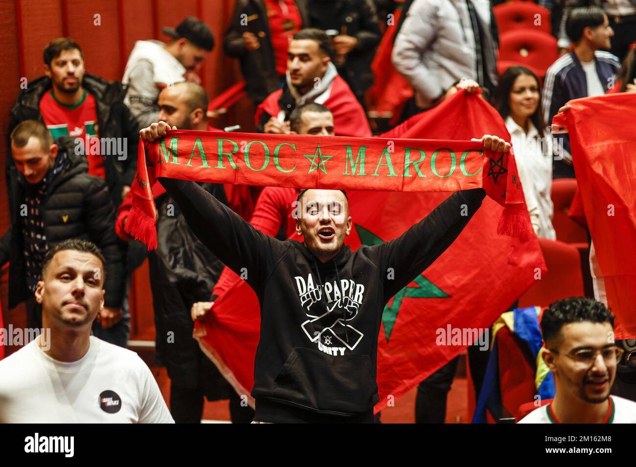 Supporters of the Moroccan football team cheer after Morocco and ...