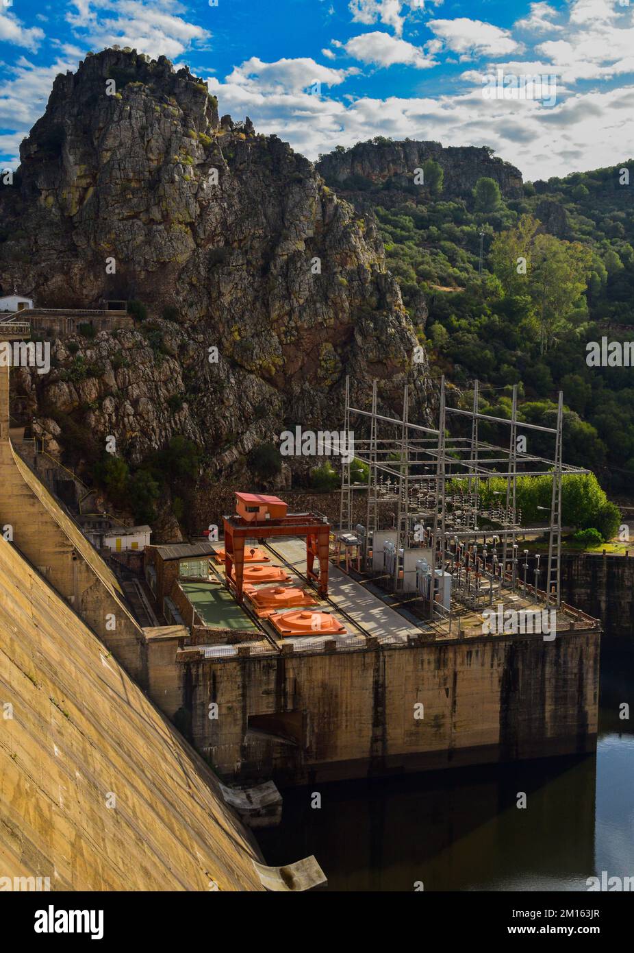 Electrical substation with bridge crane in waterfall Stock Photo - Alamy