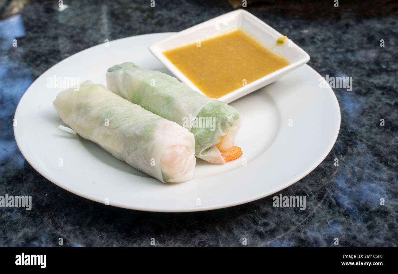 Cooked pork ears. Vietnamese cuisine traditionally includes pork parts ...