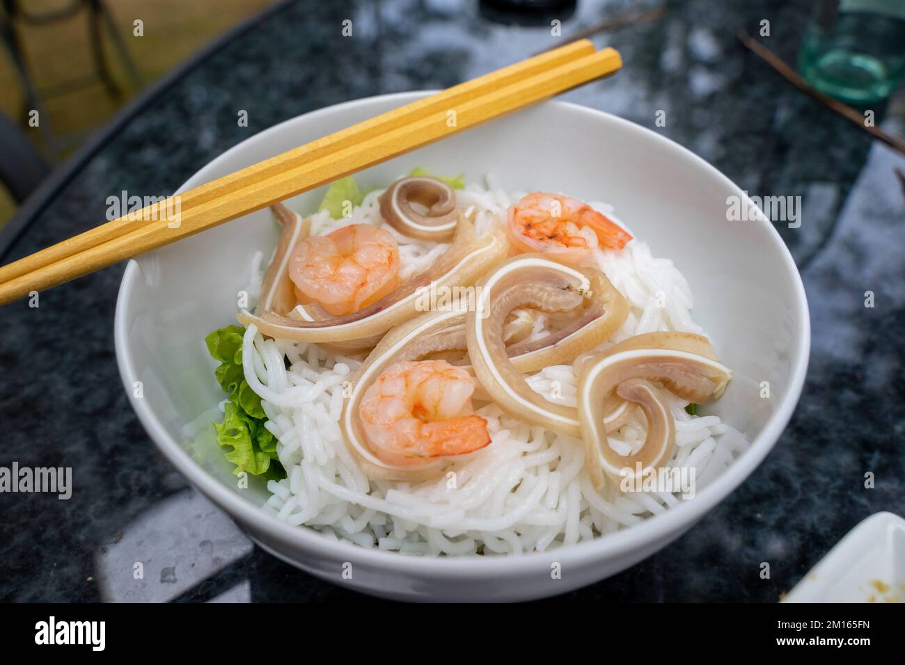 Cooked pork ears. Vietnamese cuisine traditionally includes pork parts ...