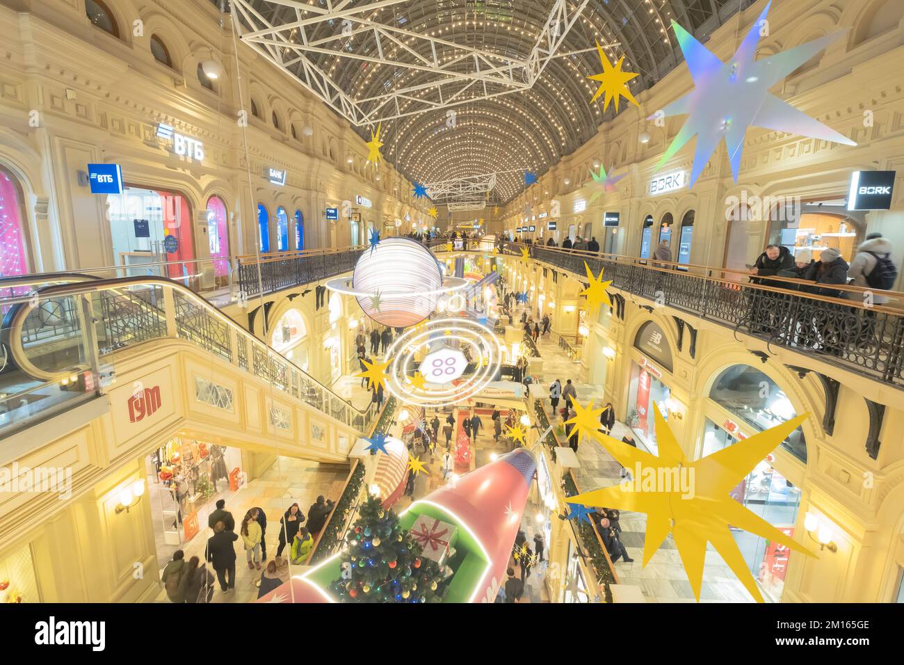 Interior of the famous GUM shopping mall in Red Square. People busy ...