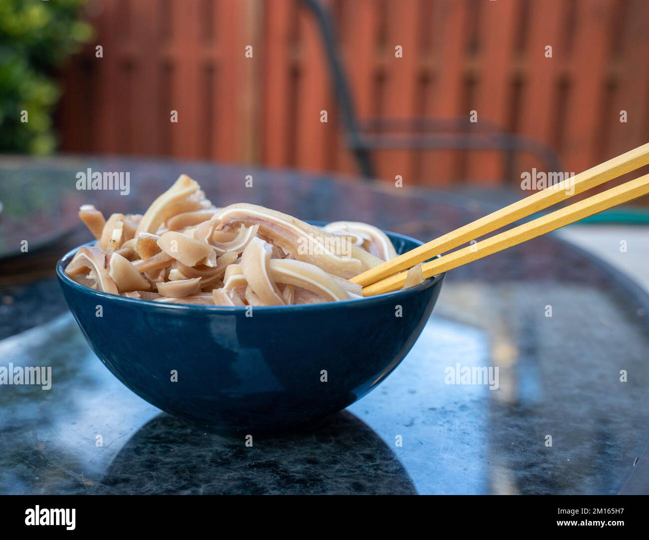 Cooked pork ears. Vietnamese cuisine traditionally includes pork parts ...