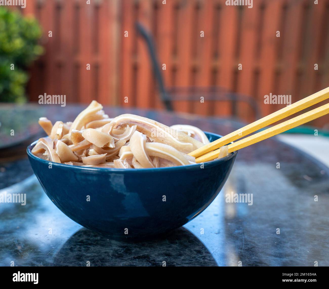 Cooked pork ears. Vietnamese cuisine traditionally includes pork parts ...