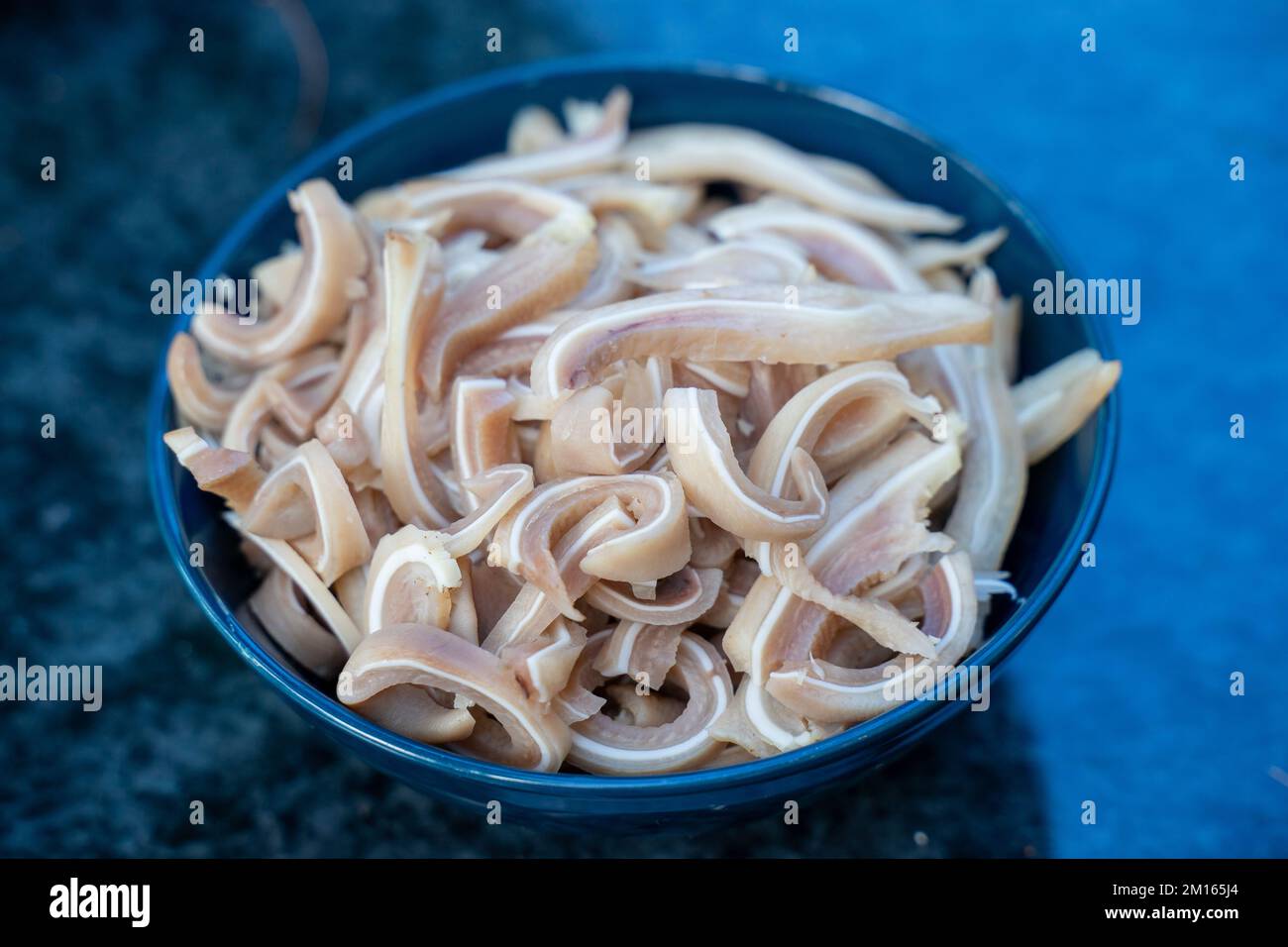 Cooked pork ears. Vietnamese cuisine traditionally includes pork parts ...